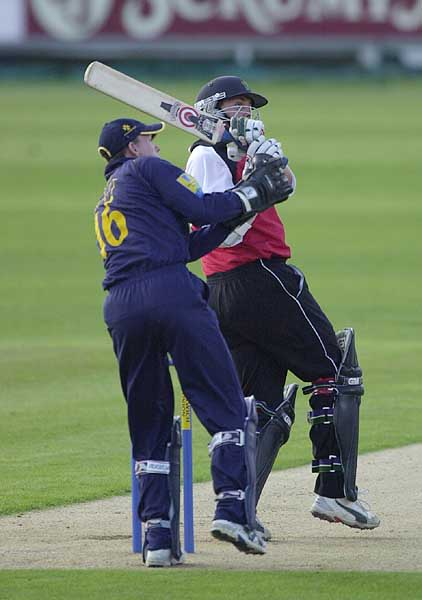 Ian Thomas hooks a Mark Davies delivery to the hands of Peng to be ...