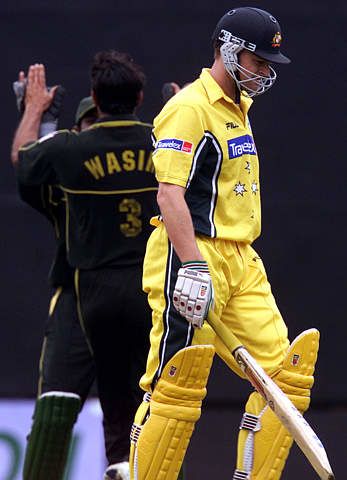 Pakistan celebrate as Adam Gilchrist is dismissed by Wasim Akram at ...