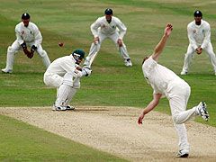 Gary Kirsten ducks beneath a bouncer from Andrew Flintoff, during his ...