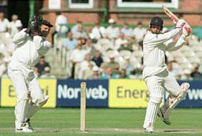 Graham Lloyd driving the ball on the off side, County Championship ...