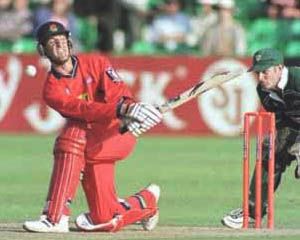 Mark Chilton attempts a sweep shot | ESPNcricinfo.com