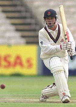 Warren Hegg follows the ball after driving it | ESPNcricinfo.com