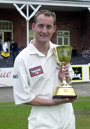 Simon Widdup celebrating the CricInfo Championship success ...