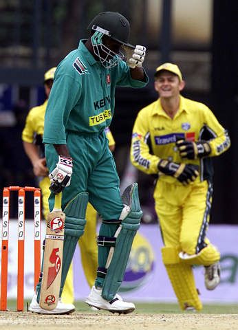 A disappointed Kennedy Otieno leaves the batting crease after being ...