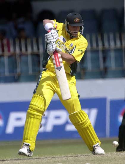 Matt Hayden chops this delivery into the off side of the wicket ...