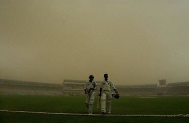 Khaled Mashud and Tapash Baisya leave the field | ESPNcricinfo.com