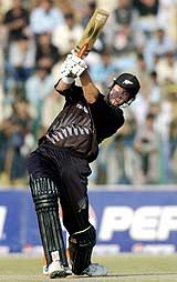 Jacob Oram goes for a big hit | ESPNcricinfo.com