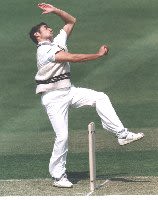 Darren Thomas in his bowling stride at Lord's in the 1996 Benson and ...