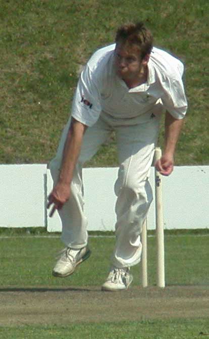 Arthur Moore puuting effort into one of his deliveries against ...