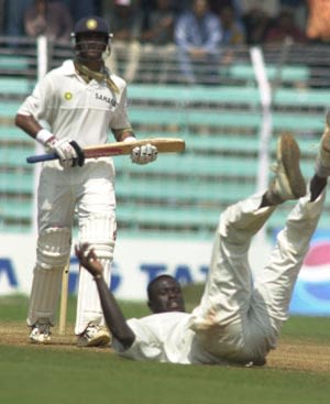 Dravid drives past a diving Cameron Cuffy | ESPNcricinfo.com