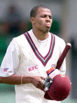 Dillon ruefully makes his way back to the pavilion after scoring a duck ...