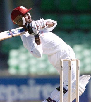 Sherwin Campbell evades a bouncer from Gavin Swan | ESPNcricinfo.com