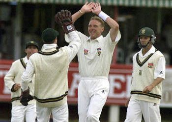 Donald celebrates the fall of Richardson with Boucher | ESPNcricinfo.com