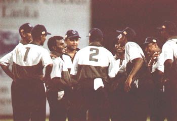 Colts team celebrate the fall of another wicket | ESPNcricinfo.com