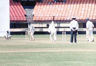 Renjith Menon about to deliver the ball to A Bhagwat | ESPNcricinfo.com