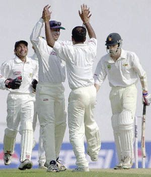 Sunil Joshi being congratulated for trapping Brian Murphy LBW ...