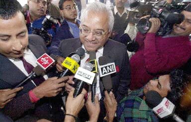 AC Muthiah being mobbed by reporters as he arrives at the Taj Man Singh ...