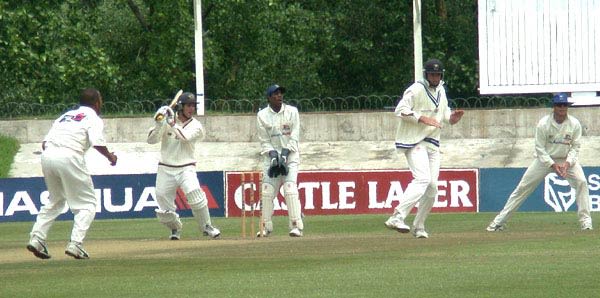 WP silly point fielder Graeme Smith takes evasive action as Boland's ...
