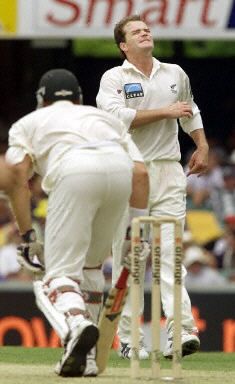 Dion Nash grimaces as he gets a delivery to pass the edge of the bat of ...