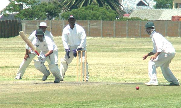 W Keraan of United sets off on a run after turning a delivery from ...