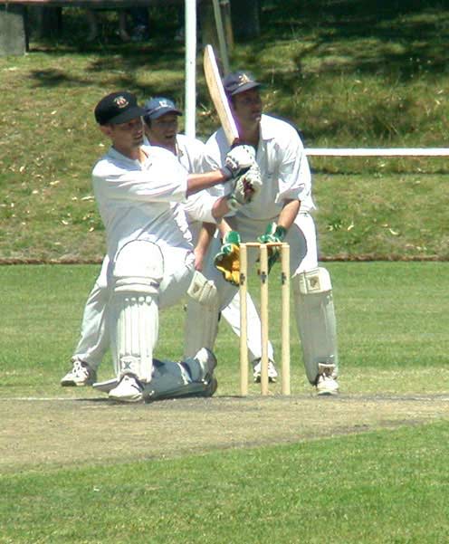 Louis du Plessis of Cape Town sweeps Ross Banatyne to the square leg ...