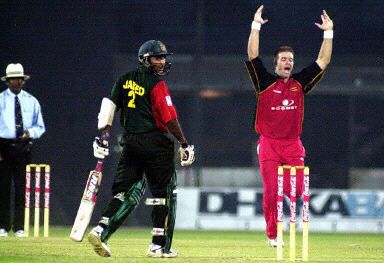 Travis Friend celebrates the wicket of Omar | ESPNcricinfo.com