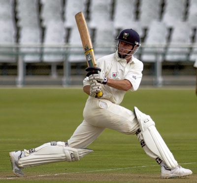 Neil Johnson sweeps a ball against North West | ESPNcricinfo.com