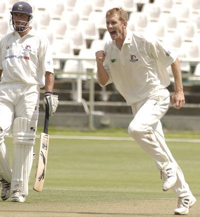 Garth Roe of North West celebrates the dismissal of Andrew Puttick ...