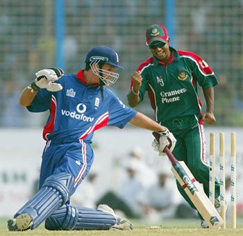 Michael Vaughan is stumped by Khaled Mashud off Manjural Islam Rana for ...