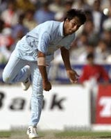 Robin Singh bowls | ESPNcricinfo.com