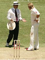 Shane Warne remonstrates with Aleem Dar after being called for a leg ...