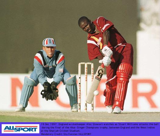 Stuart Williams on the attack, Alec Stewart watches. | ESPNcricinfo.com