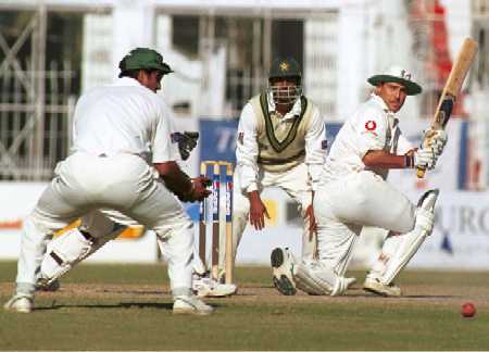 Thorpe follows the ball as he stylishly sweeps it down deep square leg ...