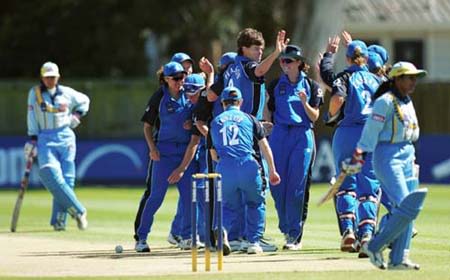 The England team celebrate the fall of an Indian wicket | ESPNcricinfo.com