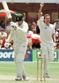 A delighted Martin after picking up the wicket of Pollock ...