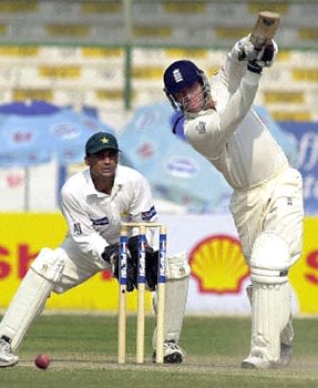 Craig White lofts for a boundary | ESPNcricinfo.com