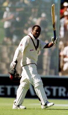 Brian Lara acknowledges the crowd on getting his century | ESPNcricinfo.com
