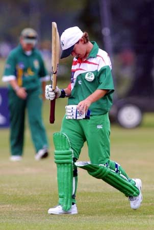 Anna Linehan hangs her head and with disappointment knocks the bat ...