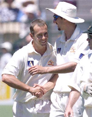 Aussie spinner Colin Miller being congratulated by Jason Gillespie ...