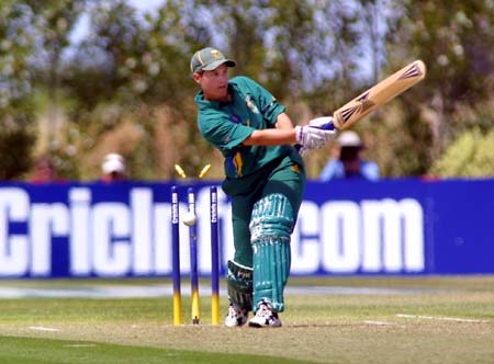 South African Anina Burger is bowled by Charmaine Mason for 14 ...