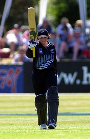 New Zealand's Anna O'Leary raises her bat to acknowledge her half ...