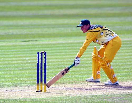 Australian Cathryn Fitzpatrick looks at the stumps and the missing bail ...