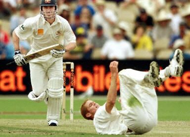 Damien Martyn drives back past bowler Pollock | ESPNcricinfo.com