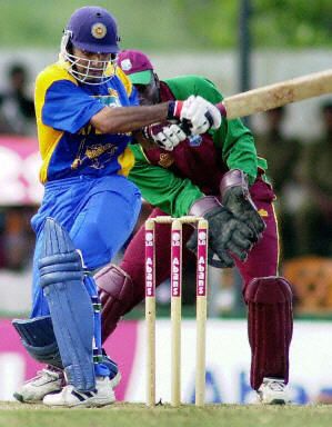 Marvan Atapattu pulls a ball to the boundary as West Indies ...
