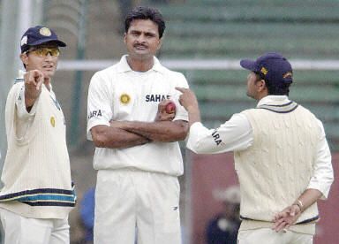 Bowler Srinath with captain Ganguly and Sachin Tendulkar setting the ...