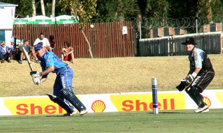 Neil Johnson cuts a ball to the point boundary against Boland ...