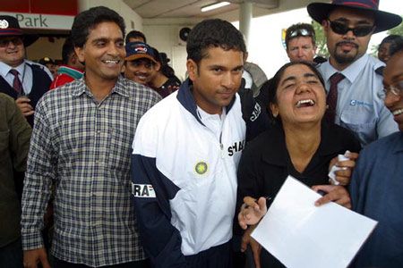 Tendulkar signs autographs for fans as he leaves the ground. 2nd Test ...