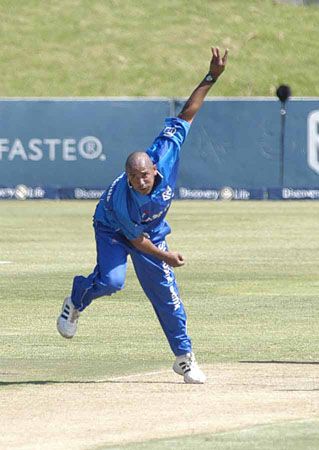 Roger Telemachus in his delivery stride against Boland | ESPNcricinfo.com